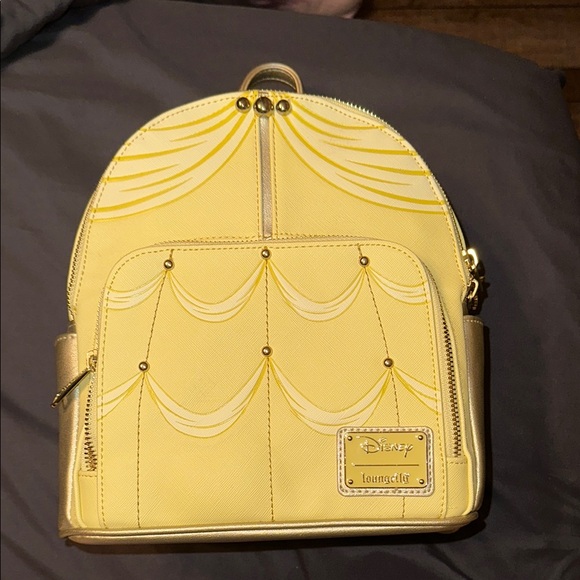 Loungefly | Bags | Loungefly Yellow Backpack With Elegant Design | Poshmark